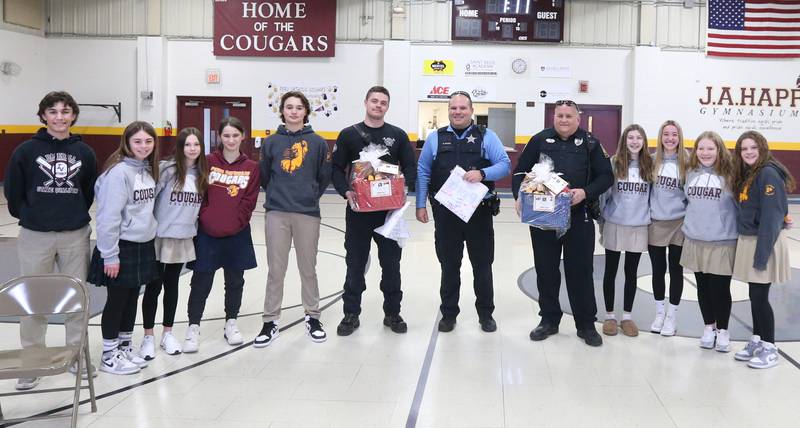 Photos: Peru Catholic honors Peru police, fire during Catholic Schools ...