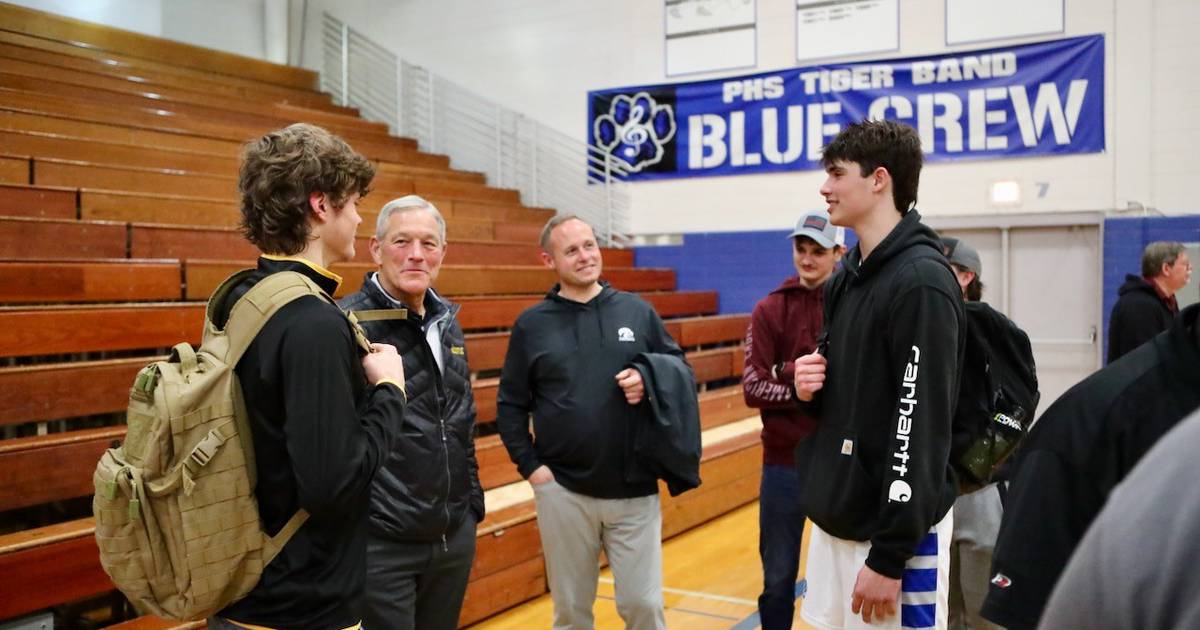 Iowa coach Kirk Ferentz watches Princeton football recruit Teegan Davis ...