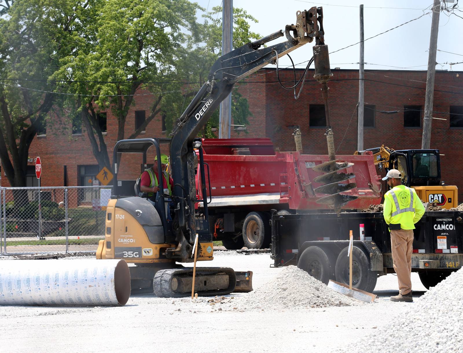 Photos: Crews pave parking lot at OSF St. Elizabeth in Peru – Shaw Local