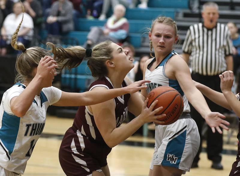 Photos: Marengo vs. Woodstock North girls basketball – Shaw Local