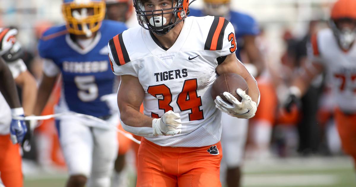 Photos: Wheaton Warrenville South vs. Simeon football – Shaw Local