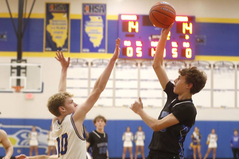 Photos: Woodstock vs. Johnsburg boys basketball – Shaw Local