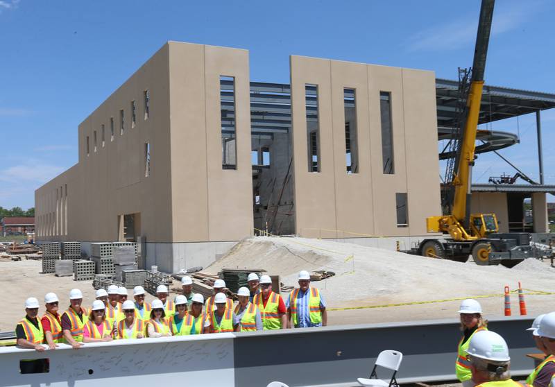 Photos: Beam signing, raising ceremony at the new YMCA site in Ottawa ...