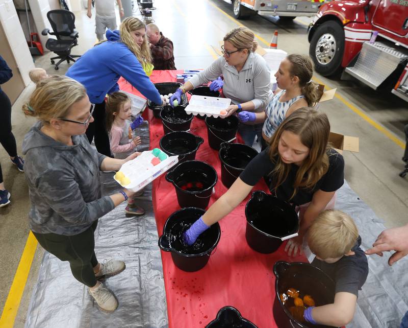Photos: Utica Fire Department dyes 160 dozen eggs for its annual Easter ...