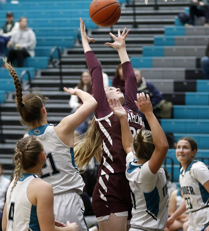Photos: Marengo vs. Woodstock North girls basketball – Shaw Local