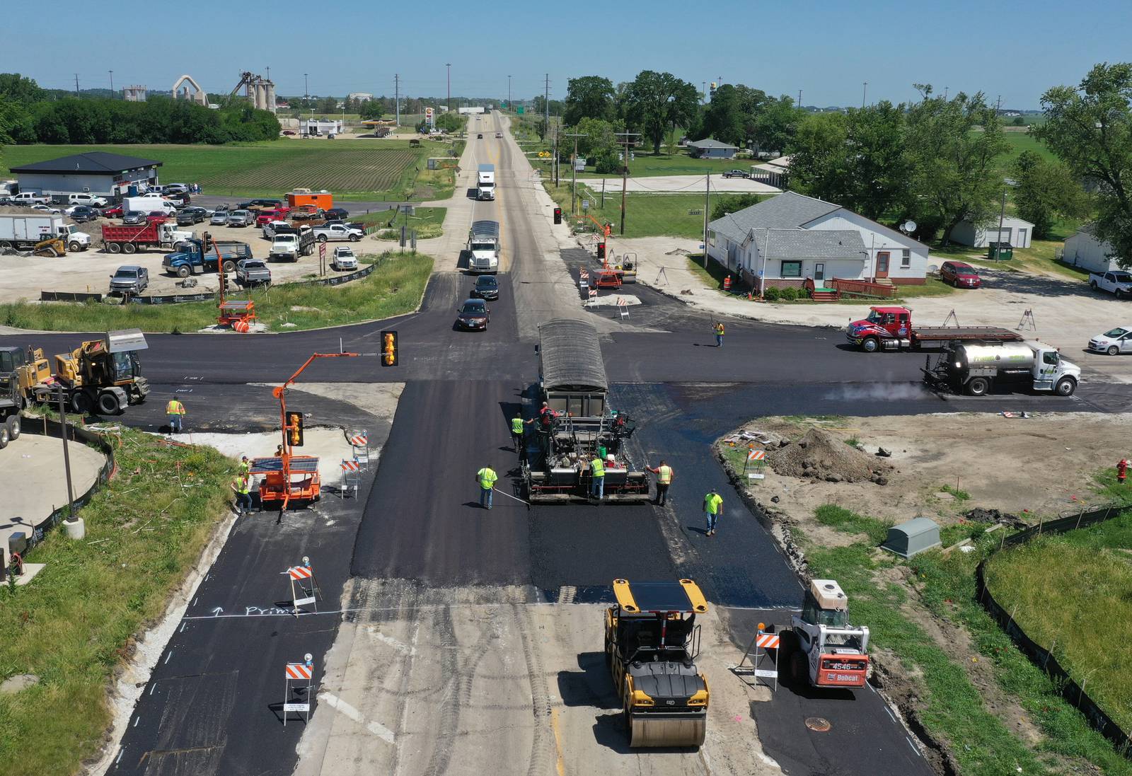 Photos: Workers pave the Utica roundabout at Route 178 and U.S. 6 ...