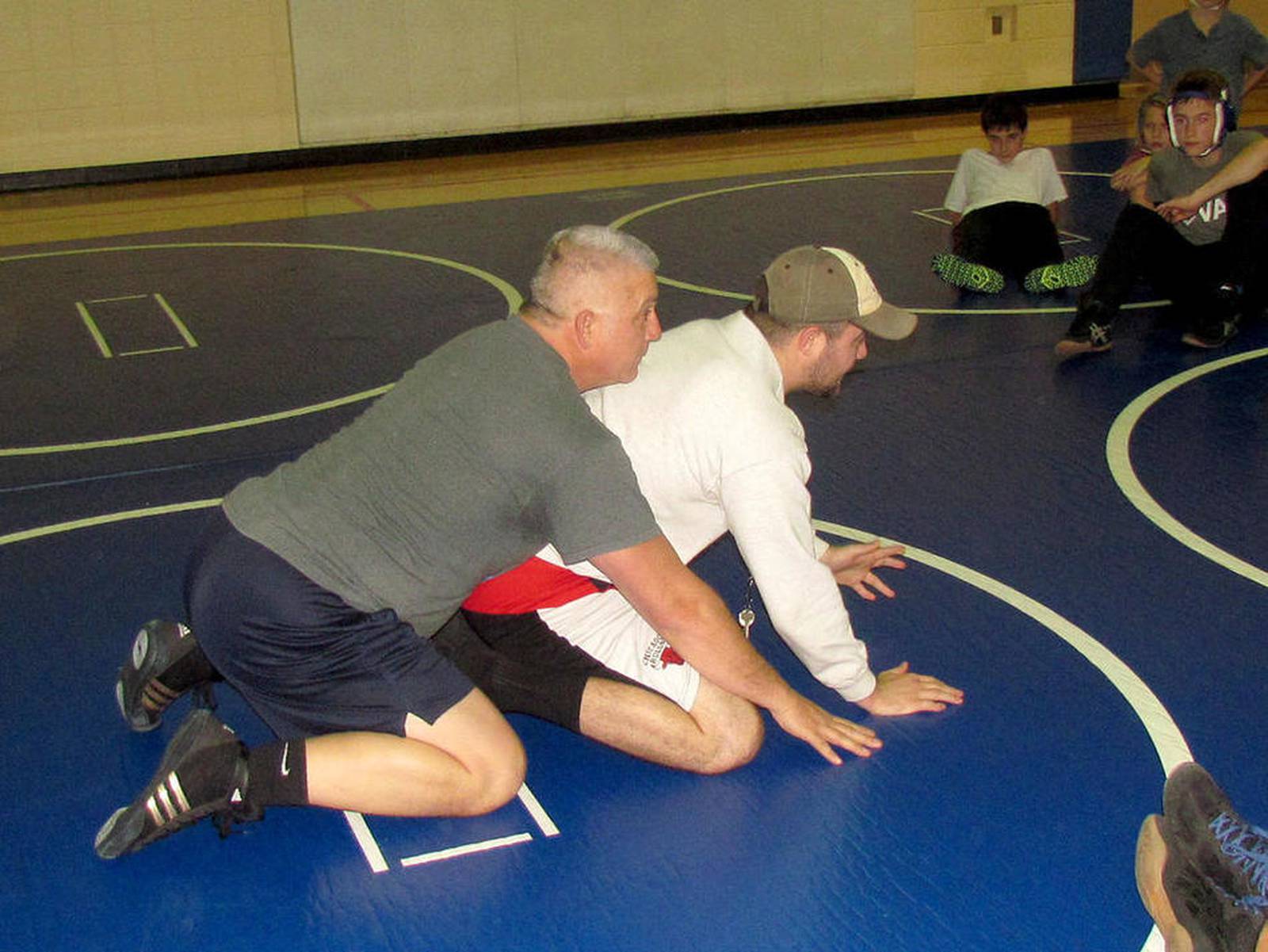 Father and son work together as coaches at Geneva Middle School South ...