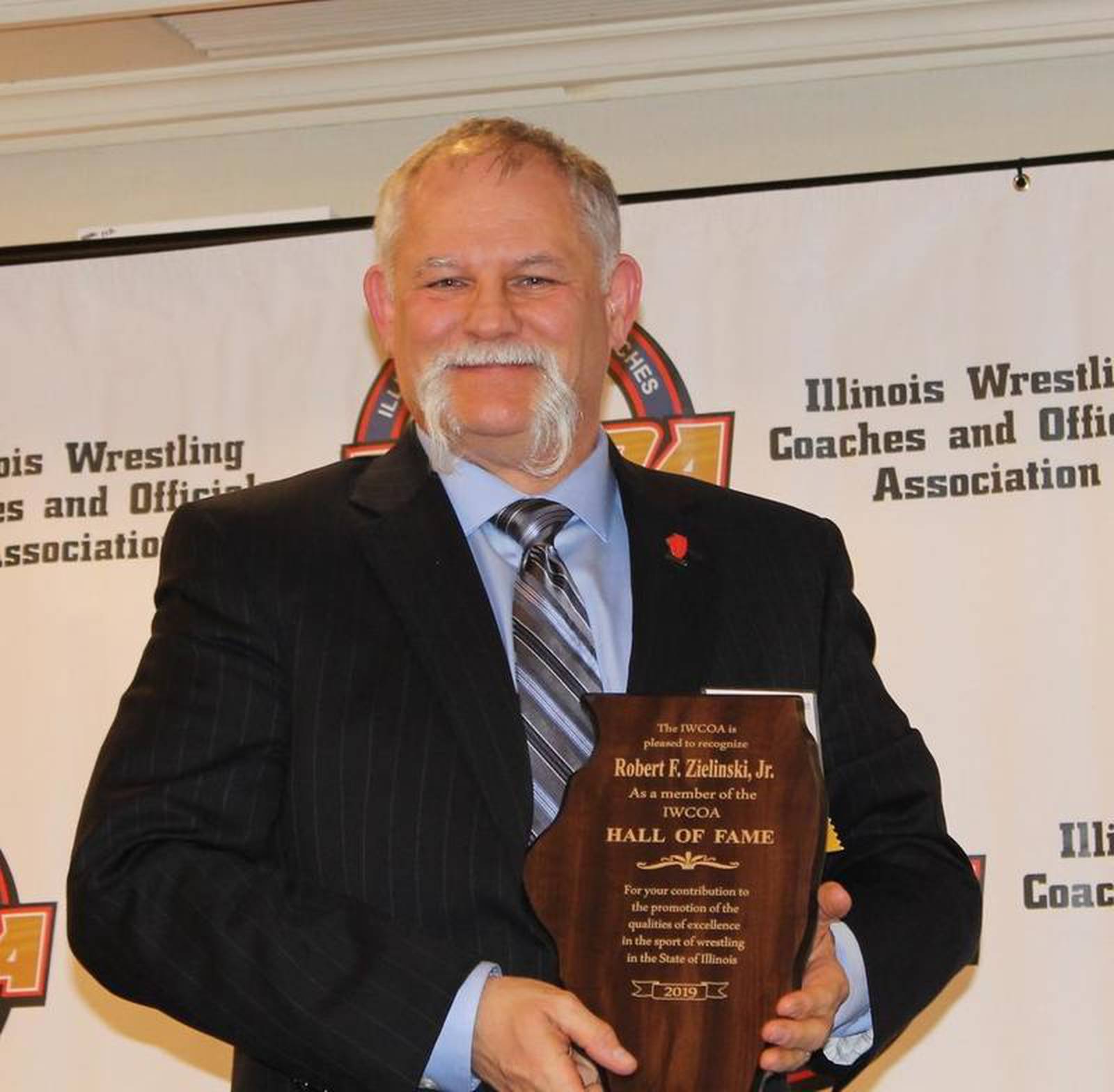 High school wrestling: Local referee, former Harvard principal ...