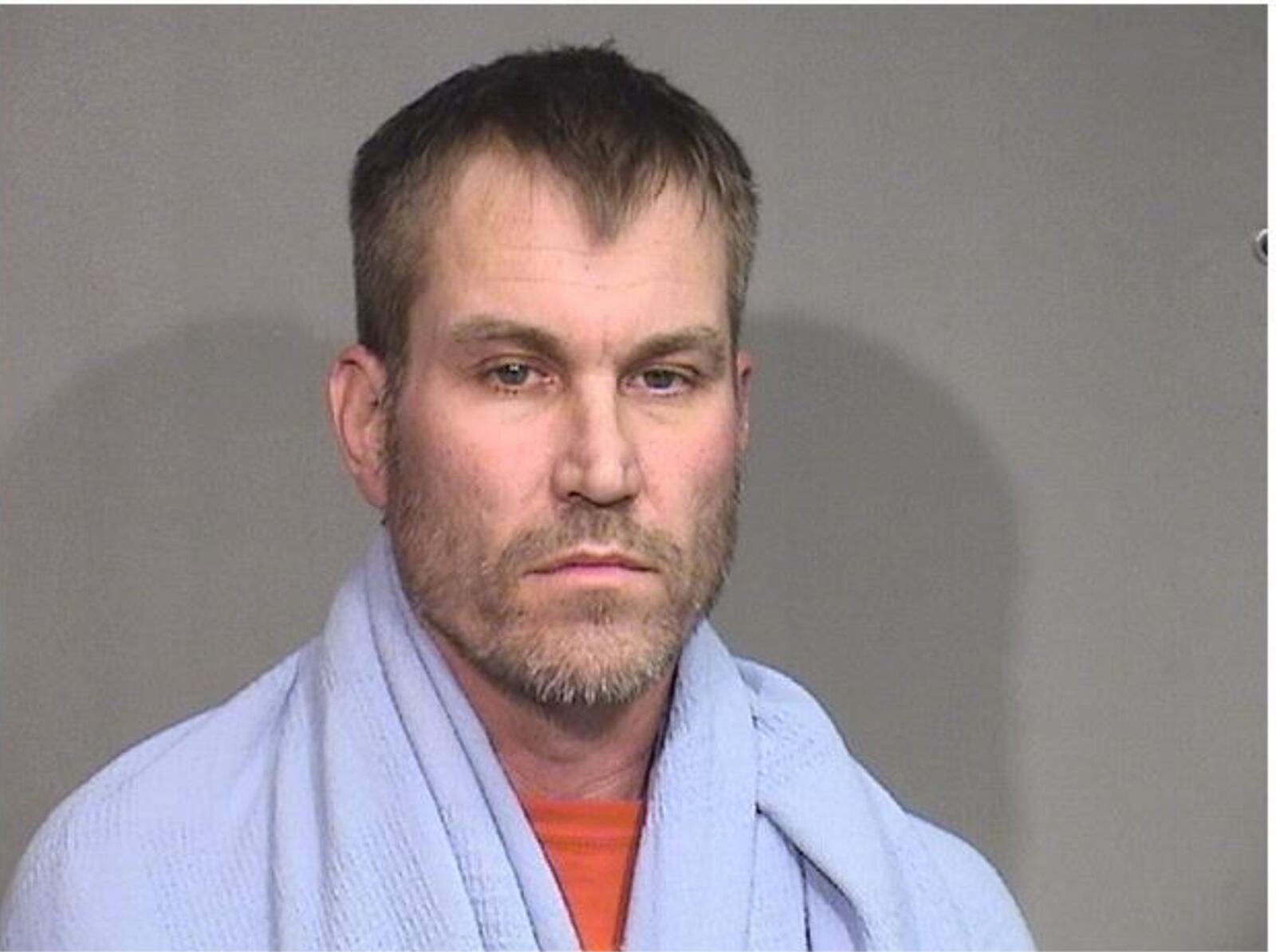 Man arrested after McHenry police standoff detained in jail pretrial ...