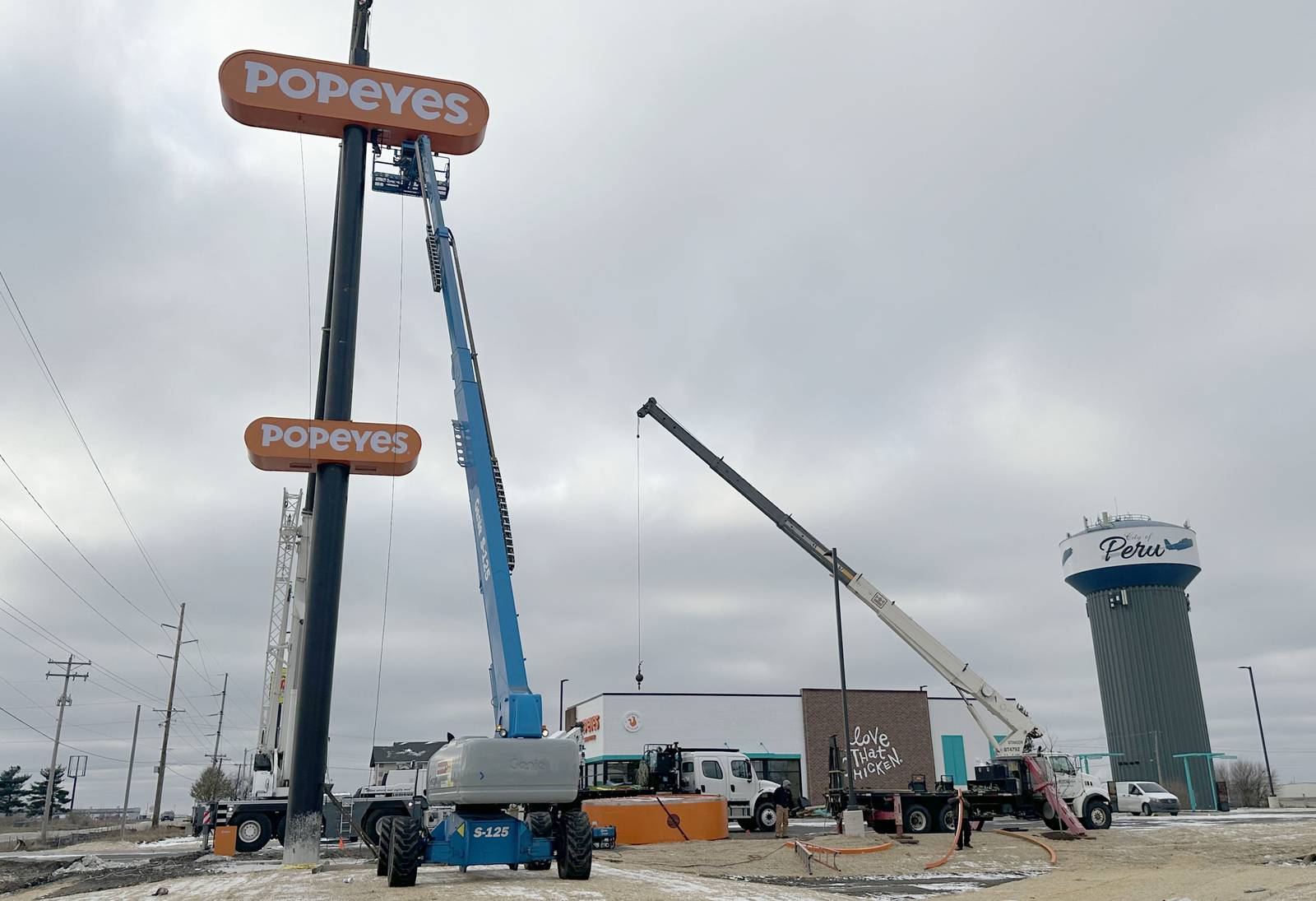 Photos: Popeyes sign goes up in Peru – Shaw Local