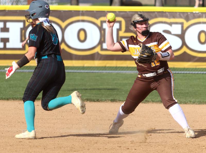 Photos: Woodstock vs. Jacobs Softball – Shaw Local