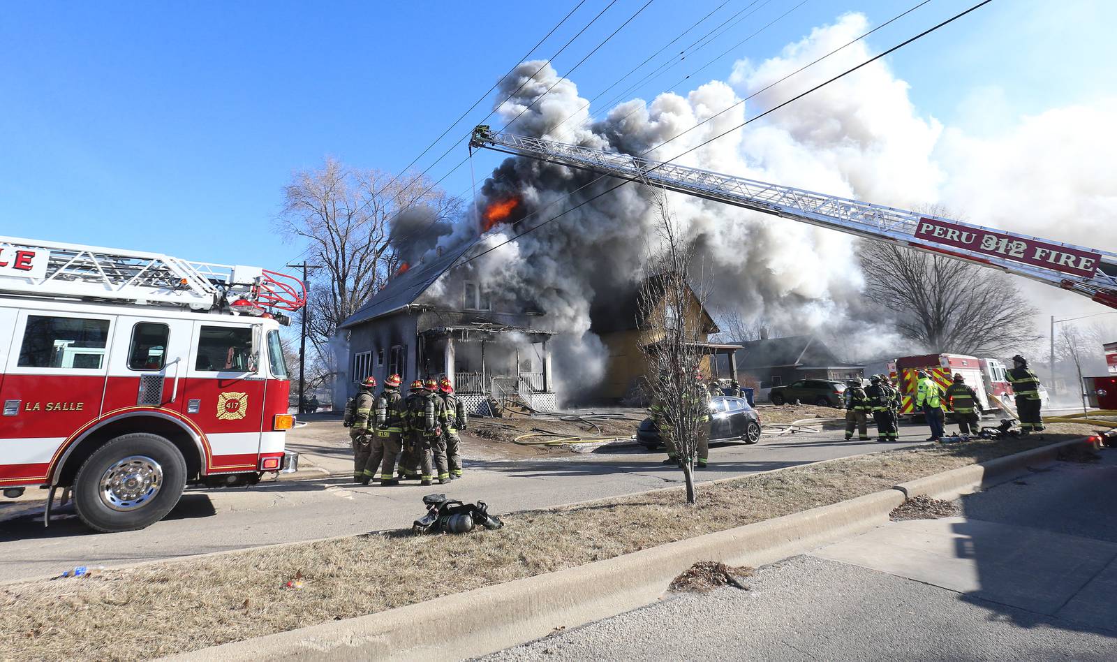 Photos: La Salle firefighters battle two-story house fire on Bucklin ...