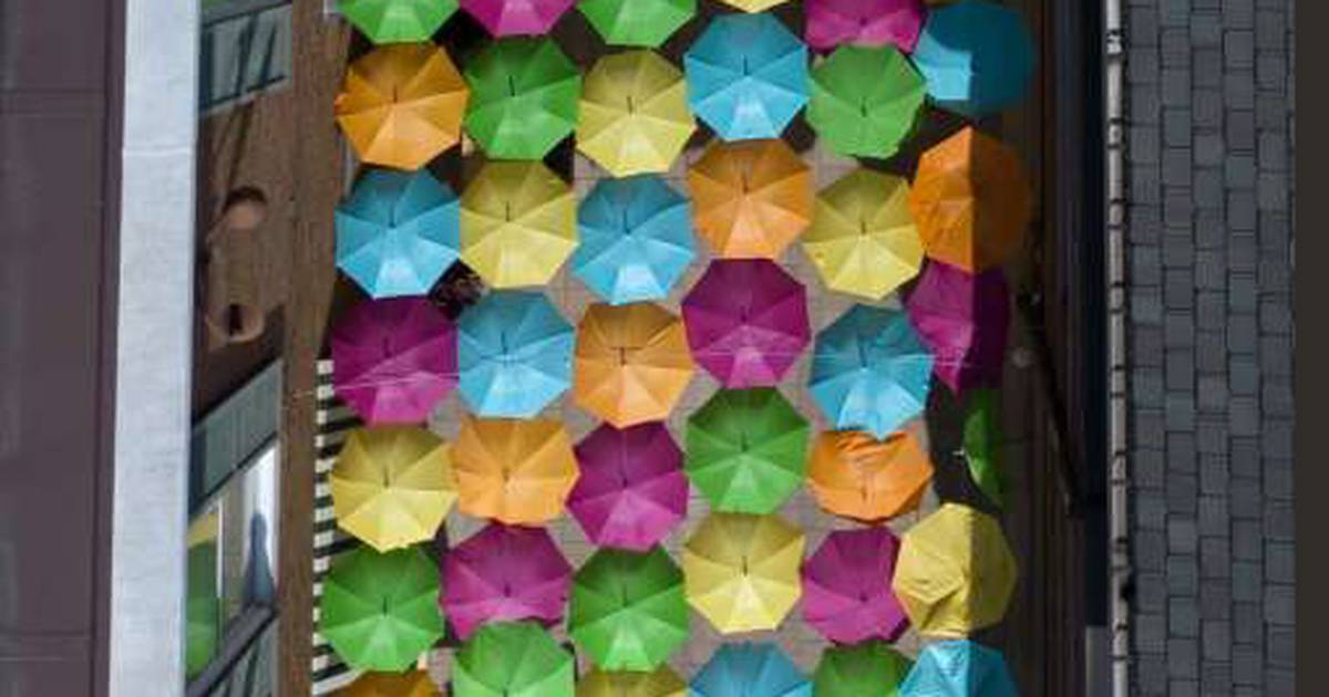 ‘It’s so Instagrammable’: Umbrella display returns to downtown Elmhurst ...