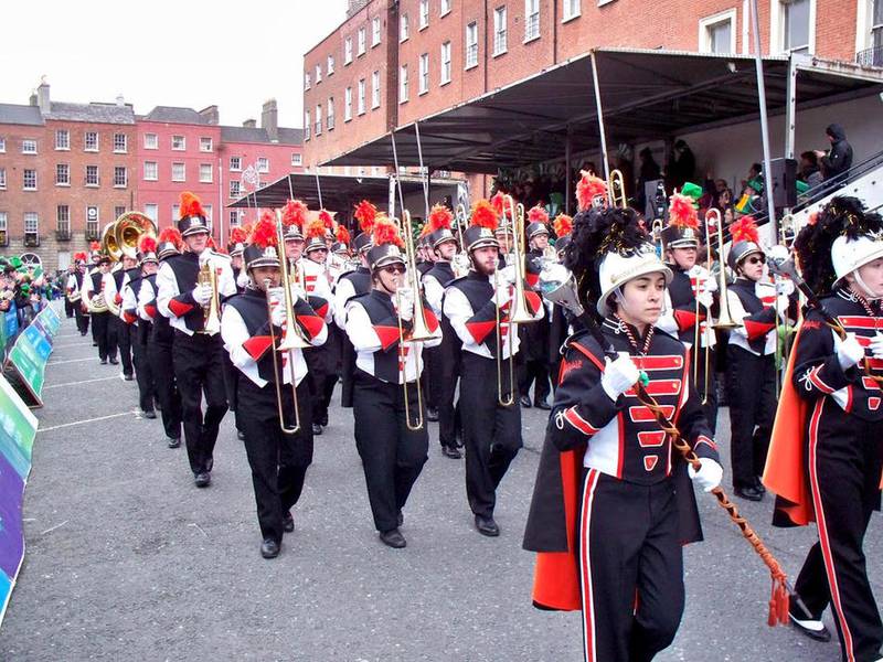 DeKalb High School's Marching Barbs parade through Dublin on St ...