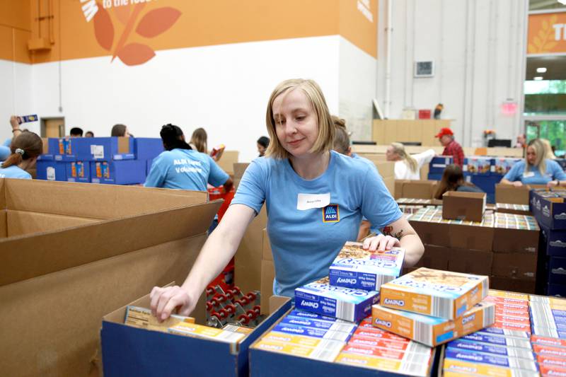 Photos: ALDI employees create disaster relief boxes at Northern ...