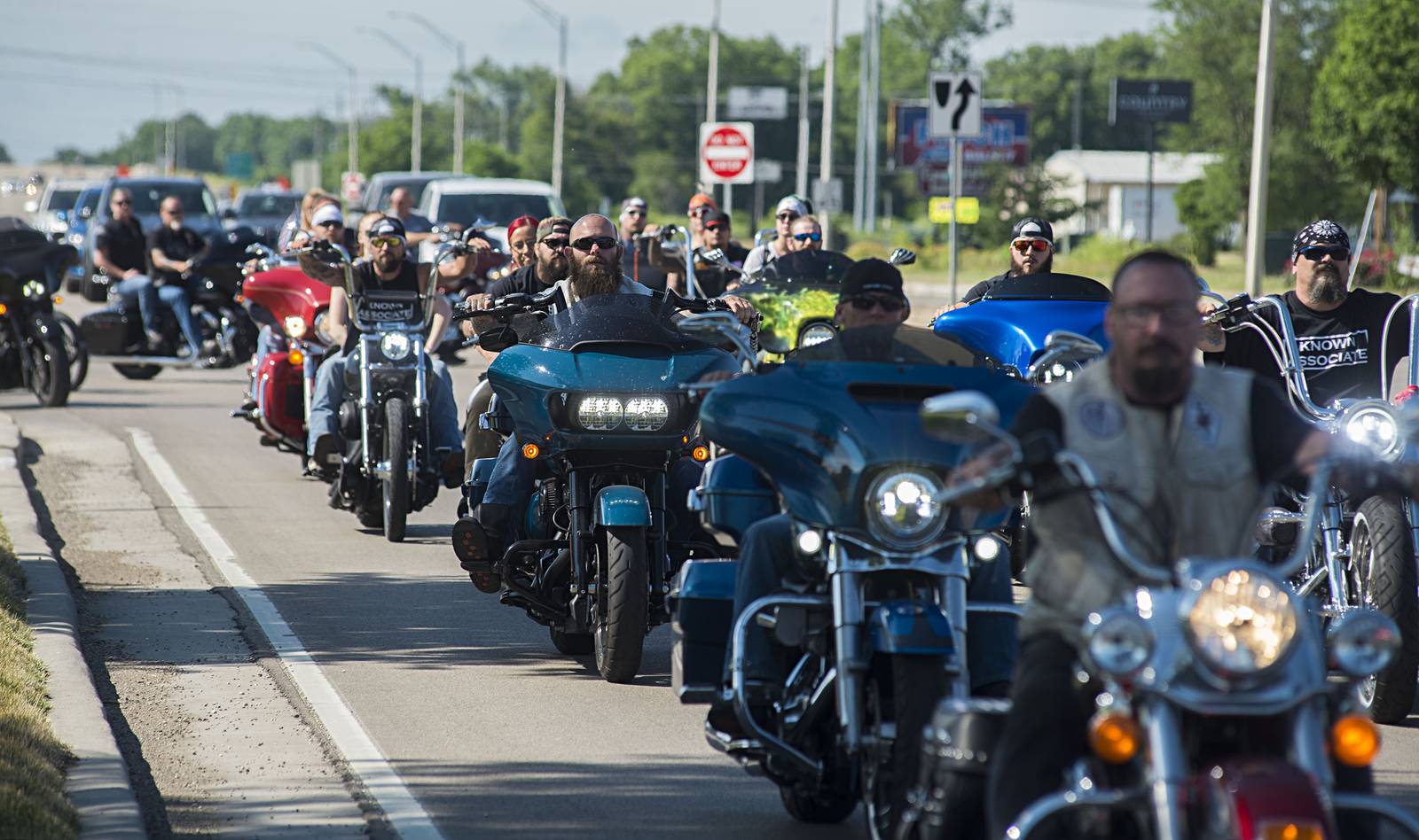 Photos: Motorcycles usher friend to burial – Shaw Local