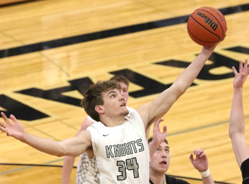 Boys basketball: Kaneland storms back late in 4th, tops Sycamore in OT to win regional semifinal ...