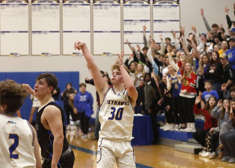 Photos: Woodstock vs. Johnsburg boys basketball – Shaw Local