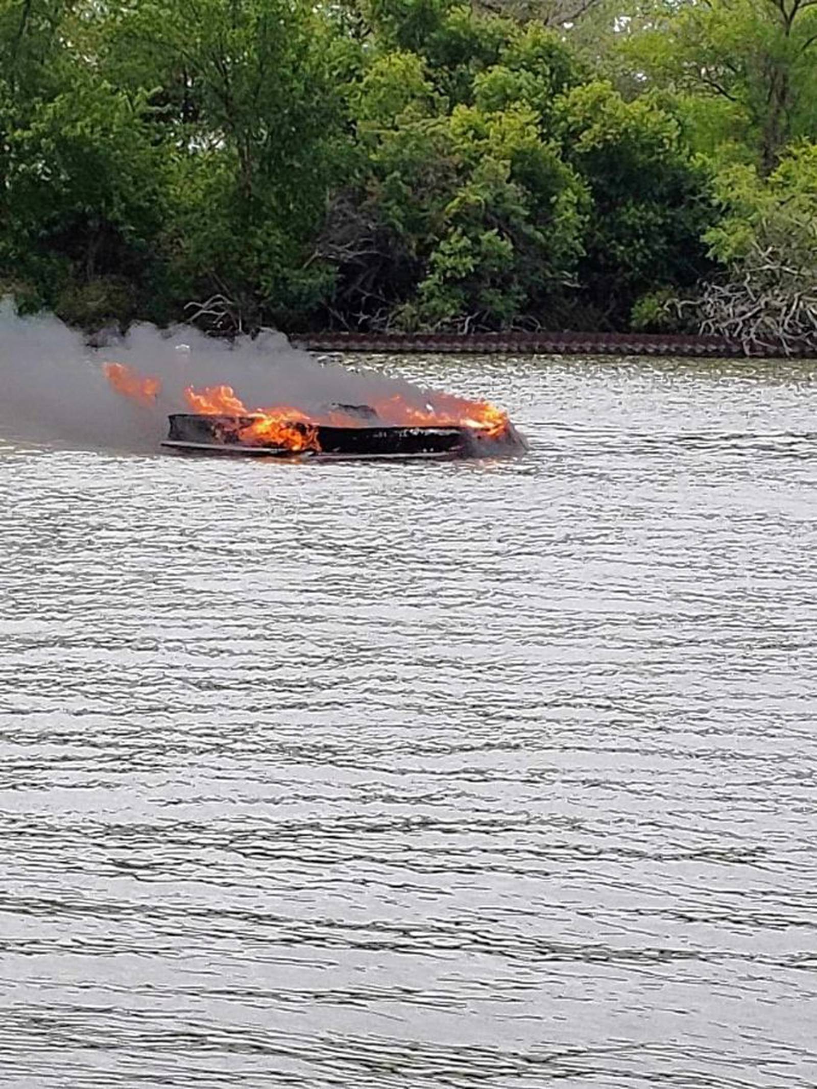Photos: Child injured when boat becomes engulfed in flames near Fox ...