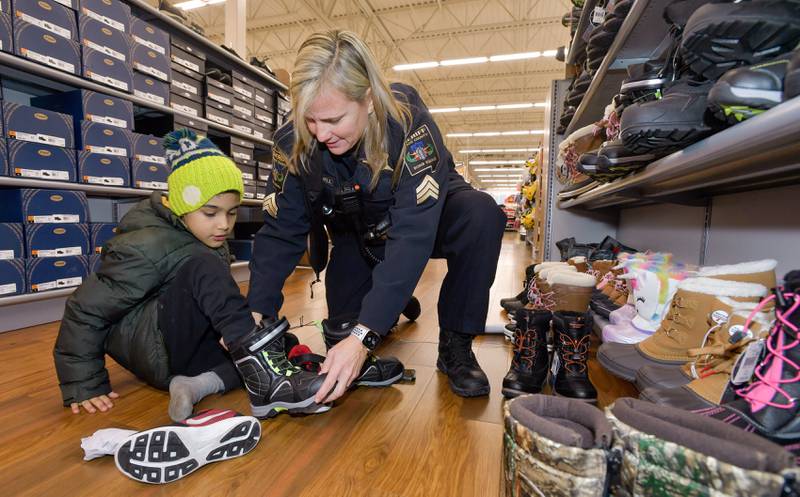 Photos: DuPage County Sheriff hosts Shop with a Sheriff event – Shaw Local