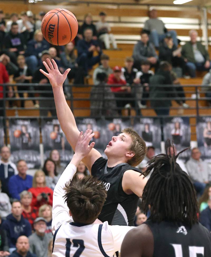 Photos: Kaneland boys basketball takes on Belvidere North in Class 3A ...