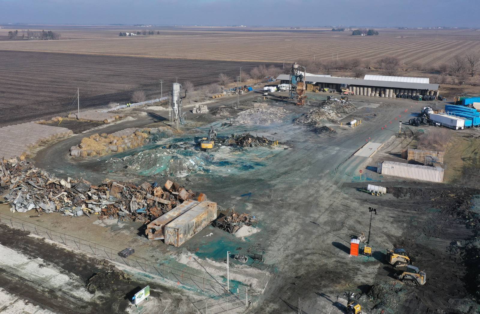 Photos: Fire continues to smolder at LSC Environmental Products near ...