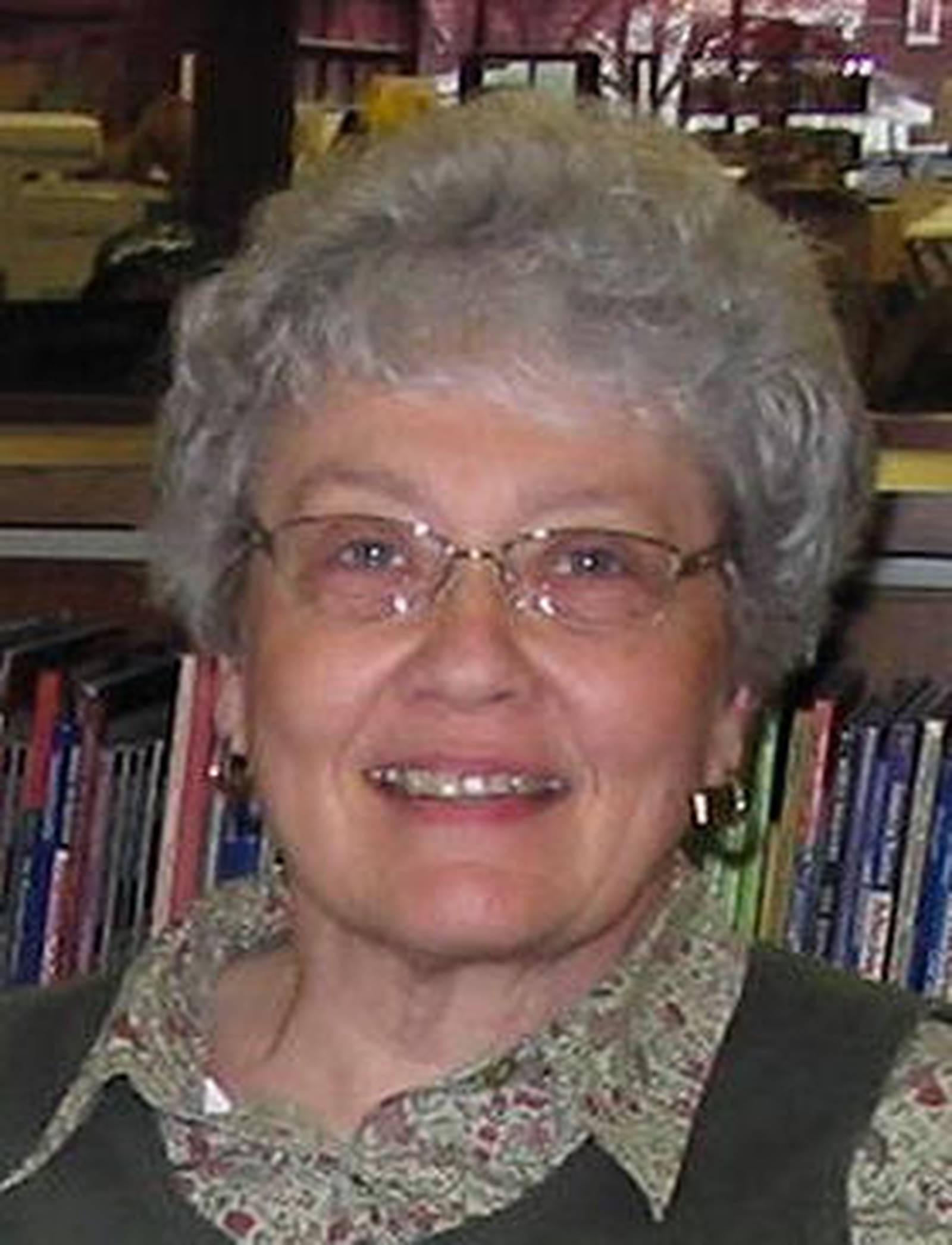 Carol Hutchings, children's librarian at Morris library, announces ...