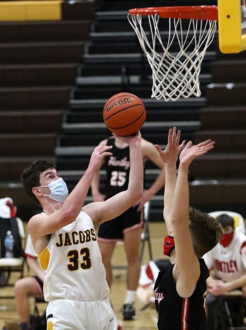 Photos: Jacobs vs Huntley boys basketball – Shaw Local
