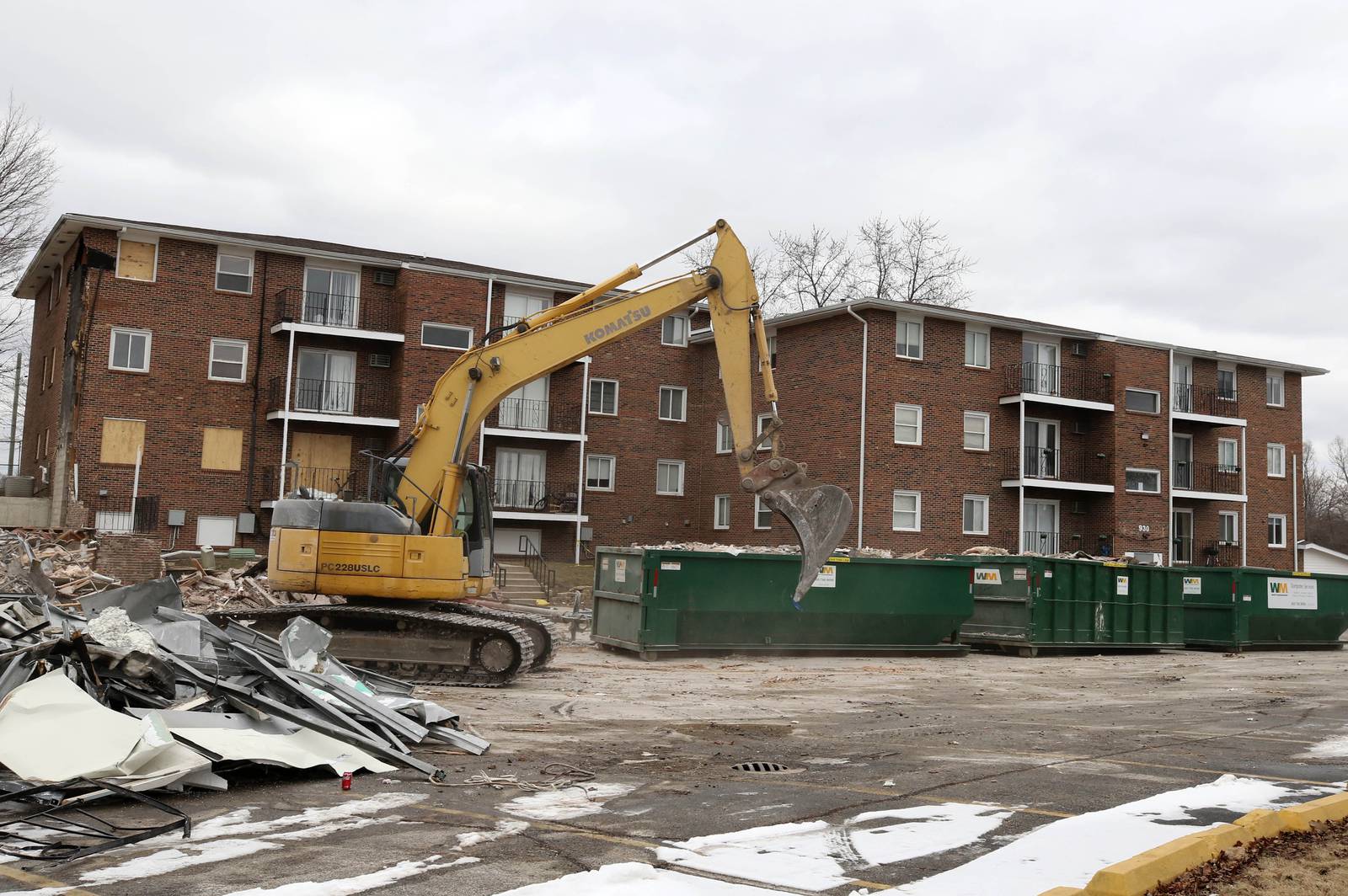Photos: Condemned DeKalb apartment building demolished after fire ...