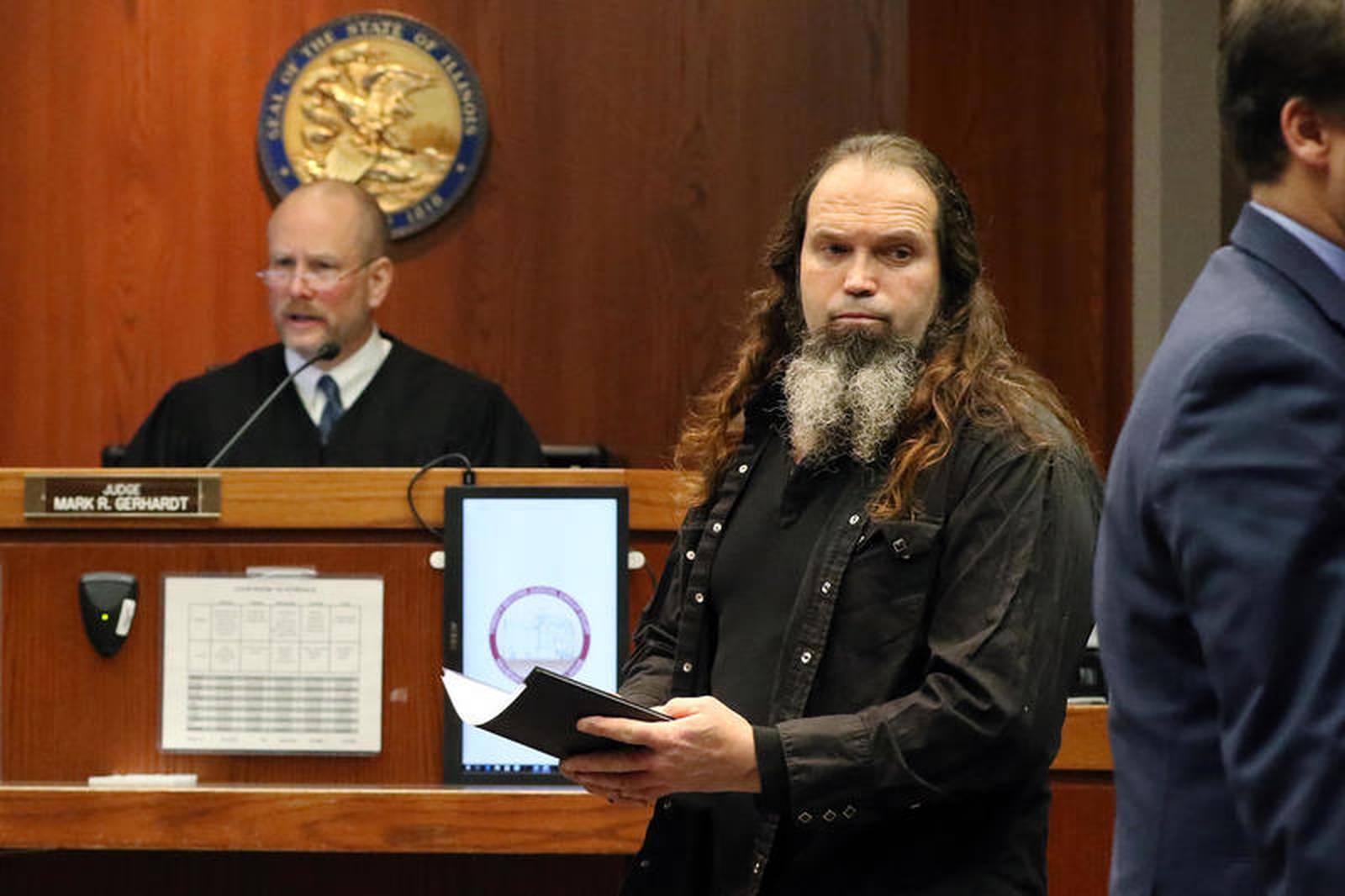 Verdict: McHenry man not guilty of beating his dog with garbage can lid ...