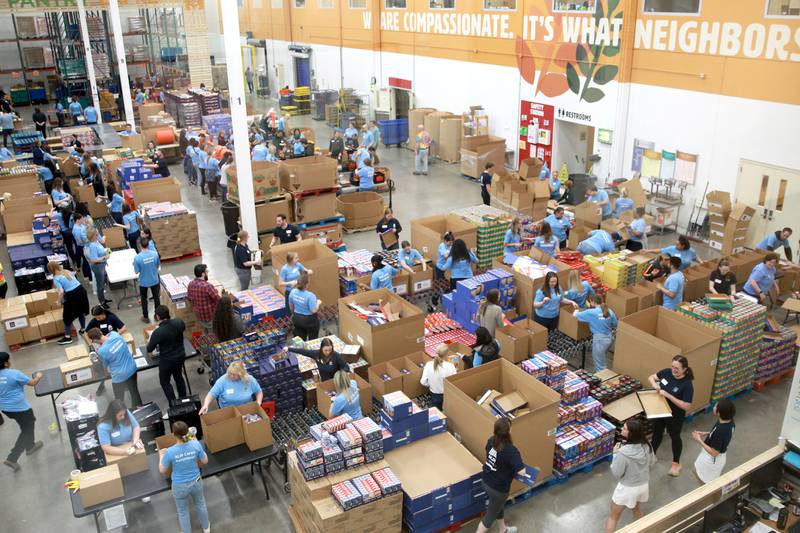 Photos: ALDI employees create disaster relief boxes at Northern ...