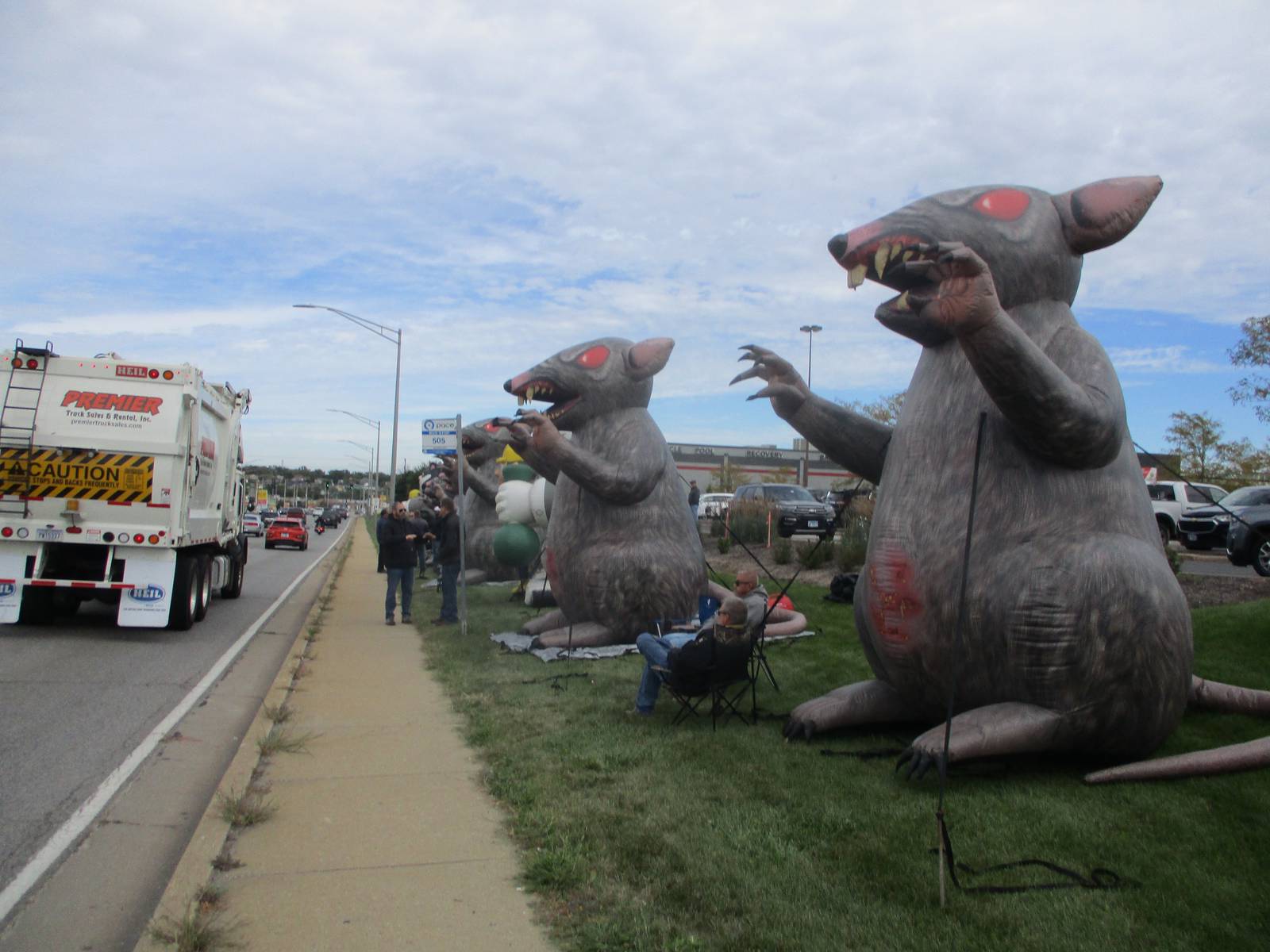 14 inflatable rats and a cat line Larkin Avenue as unions protest ...