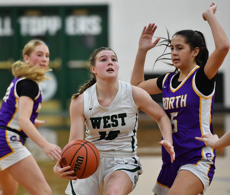 Photos: Glenbard West vs. Downers Grove North in girls basketball ...