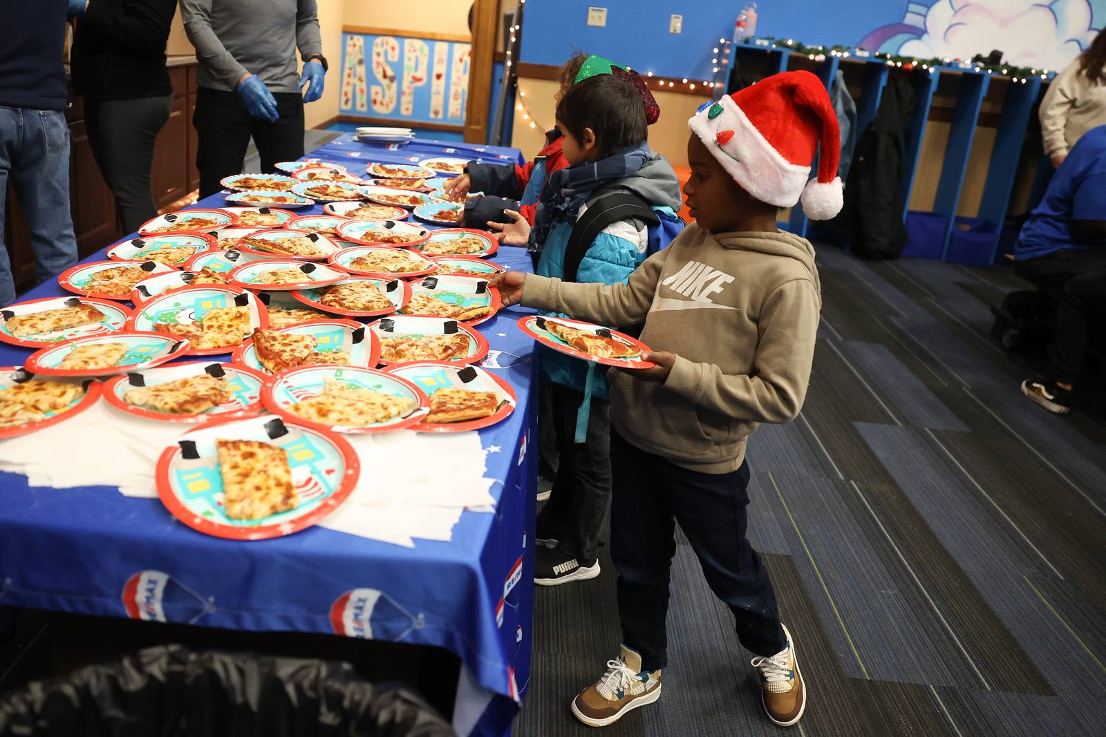 RE/MAX throws pizza party for Joliet Boys and Girls Club – Shaw Local