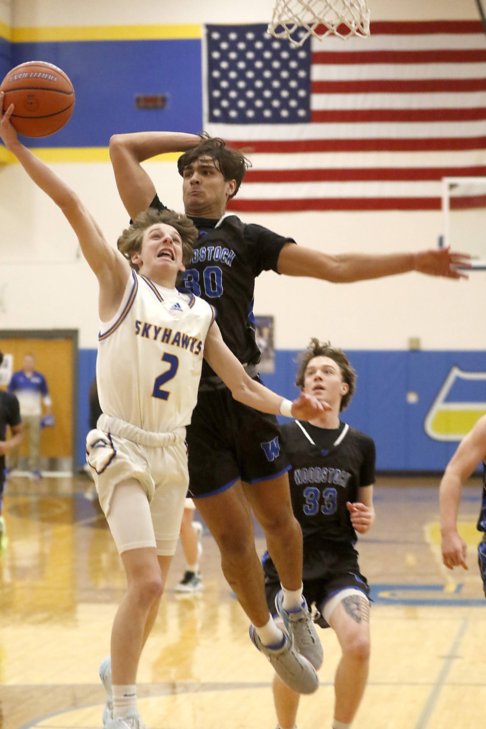 Photos: Woodstock vs. Johnsburg boys basketball – Shaw Local
