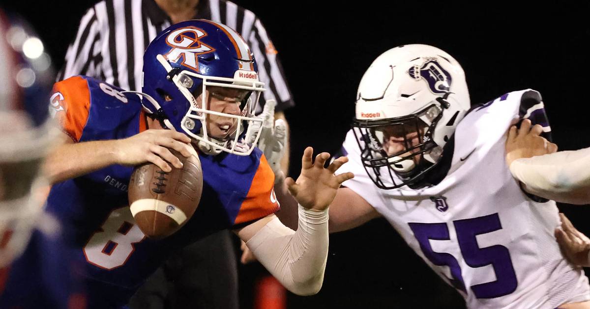 Photos: Dixon football travels to Genoa to take on Cogs of Genoa ...