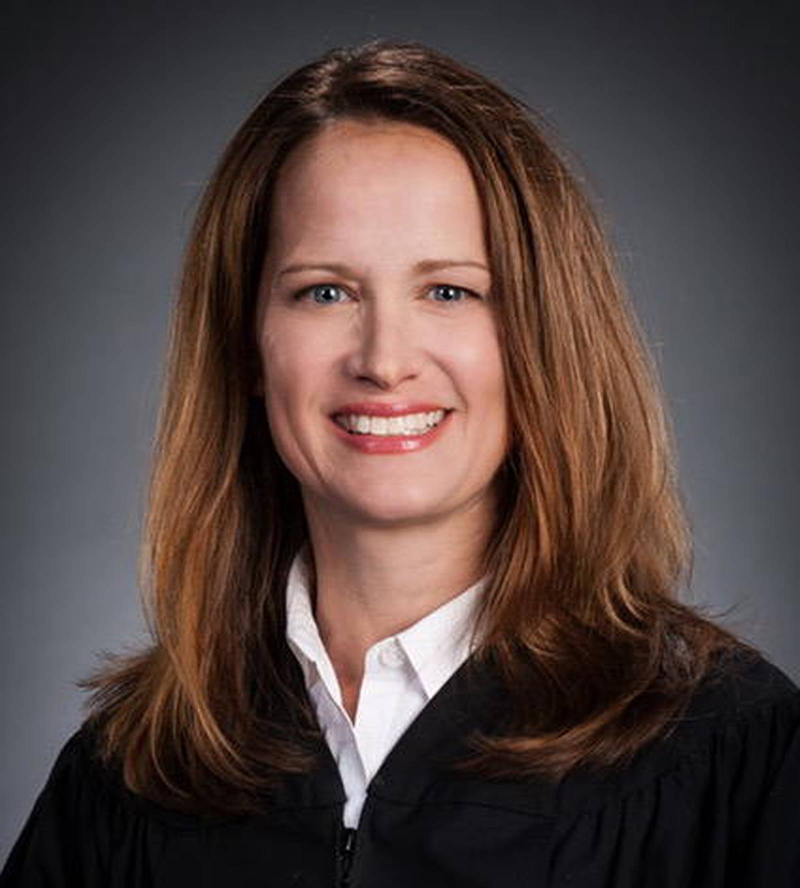 Pedersen, Flood spar over life experiences, qualifications for judge ...