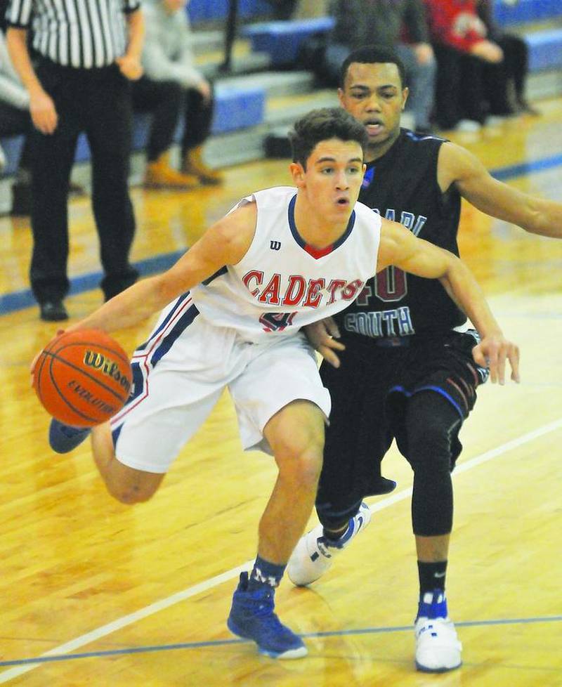 High school boys basketball: Tommy Surges big part of Marmion ...